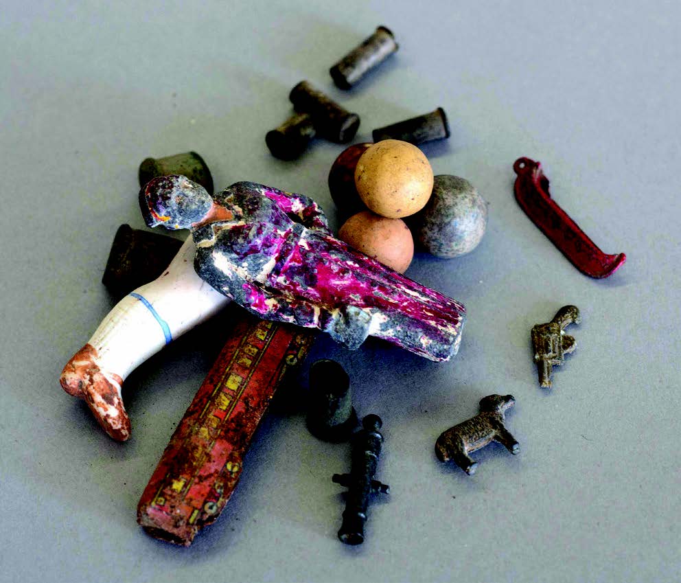 Various toys and bullet casings recovered from the McSween House in ...