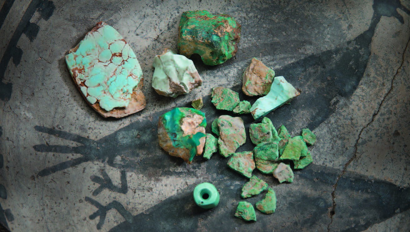Raw turquoise and ornaments from Pindi Pueblo in a Pindi Black-on-white ...